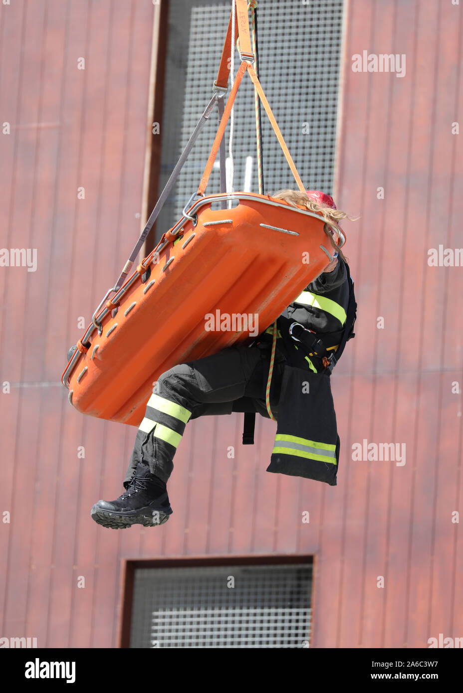 Practice on the fire department with firefighter and the stretcher ...