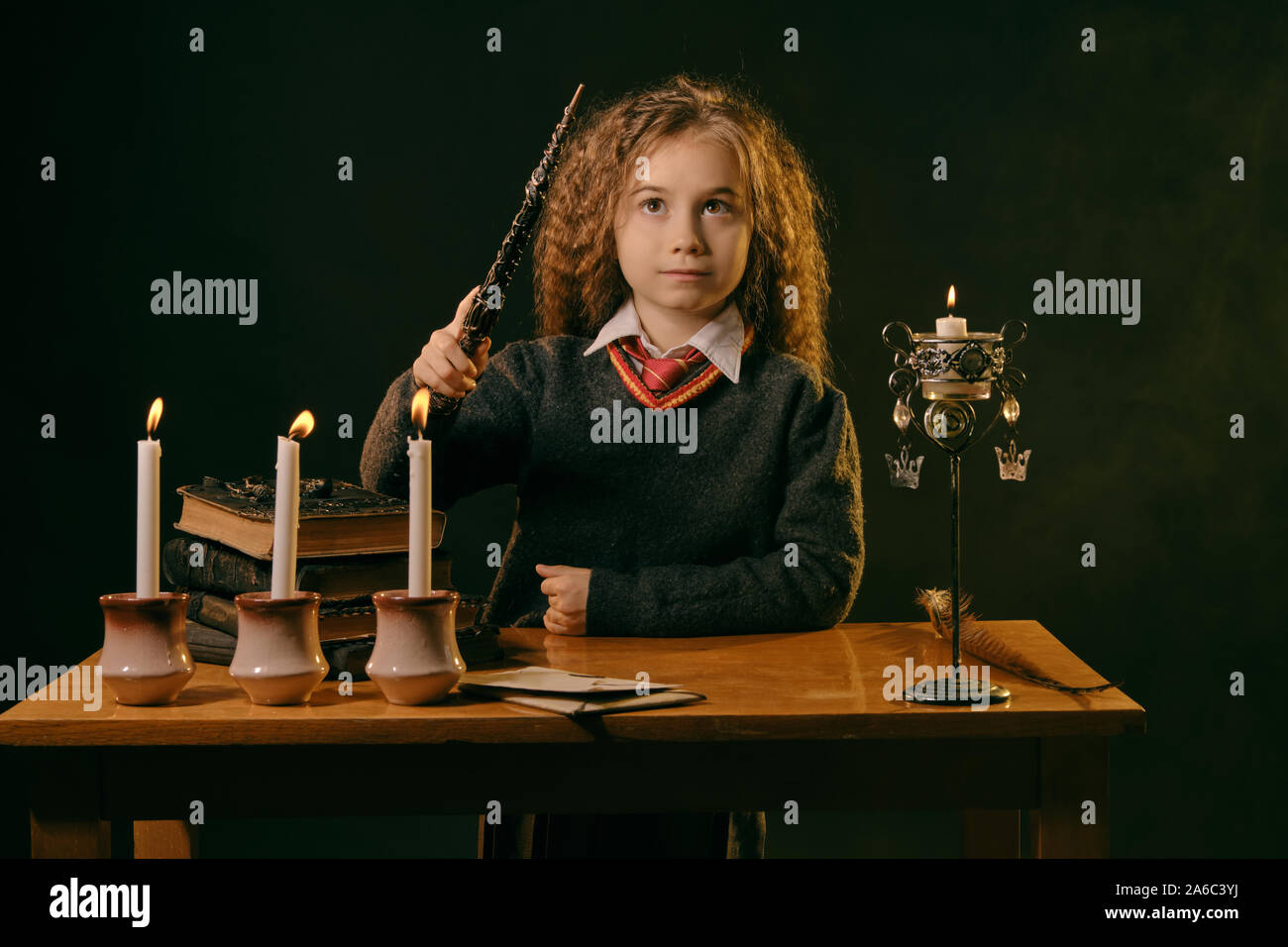 Portrait of a nice little charmer with magnificent long brown hair ...