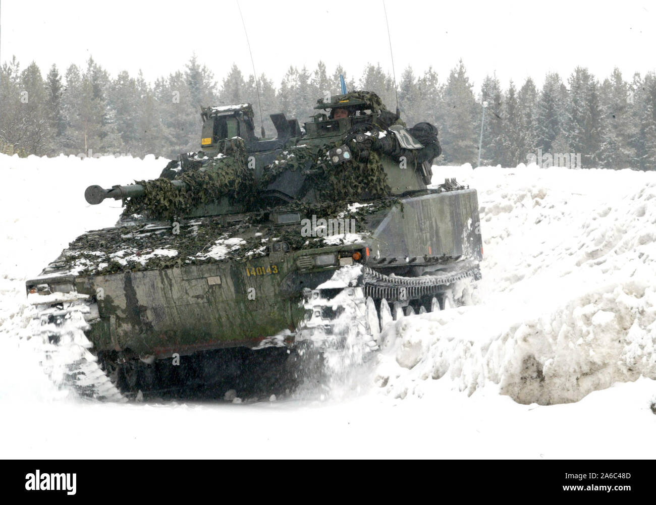 Swedish soldiers with tanks on military exercise, Kvarn firing range ...
