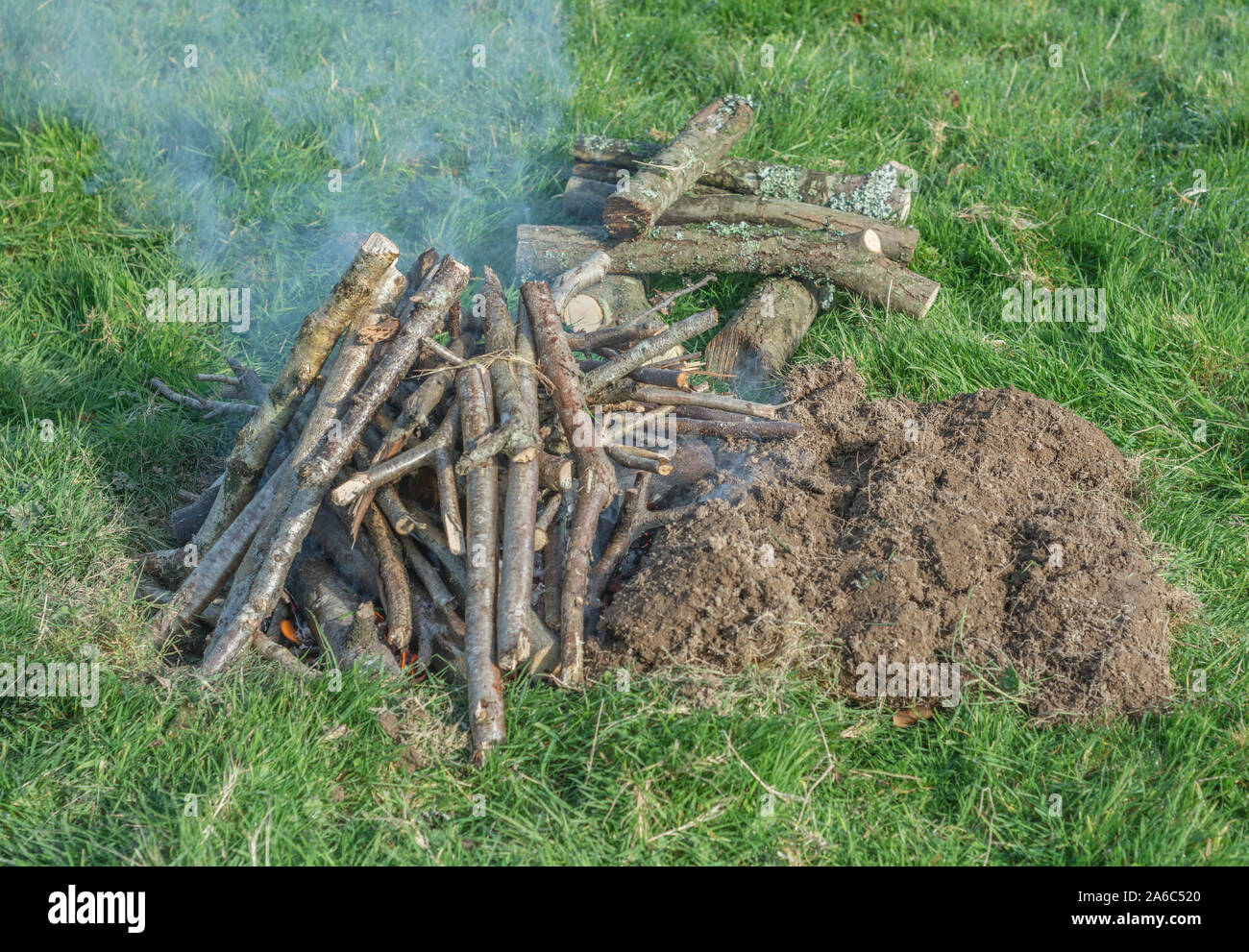Putting a log on the fire hi-res stock photography and images - Alamy