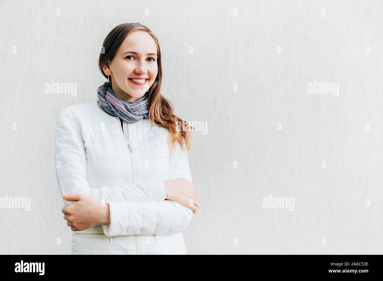 Woman with arms crossed over chest hi-res stock photography and images ...