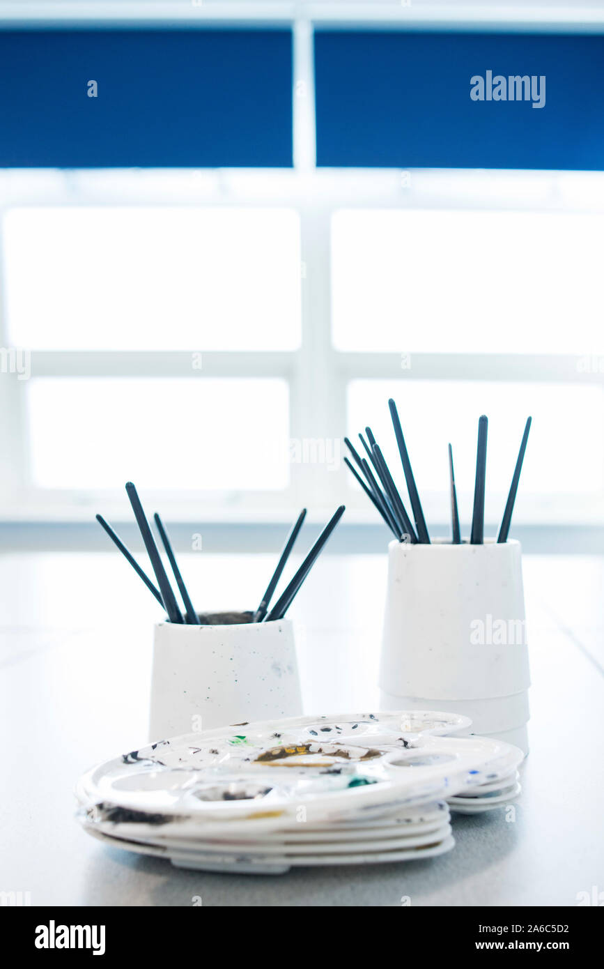 An empty art classroom with art equipment Stock Photo - Alamy
