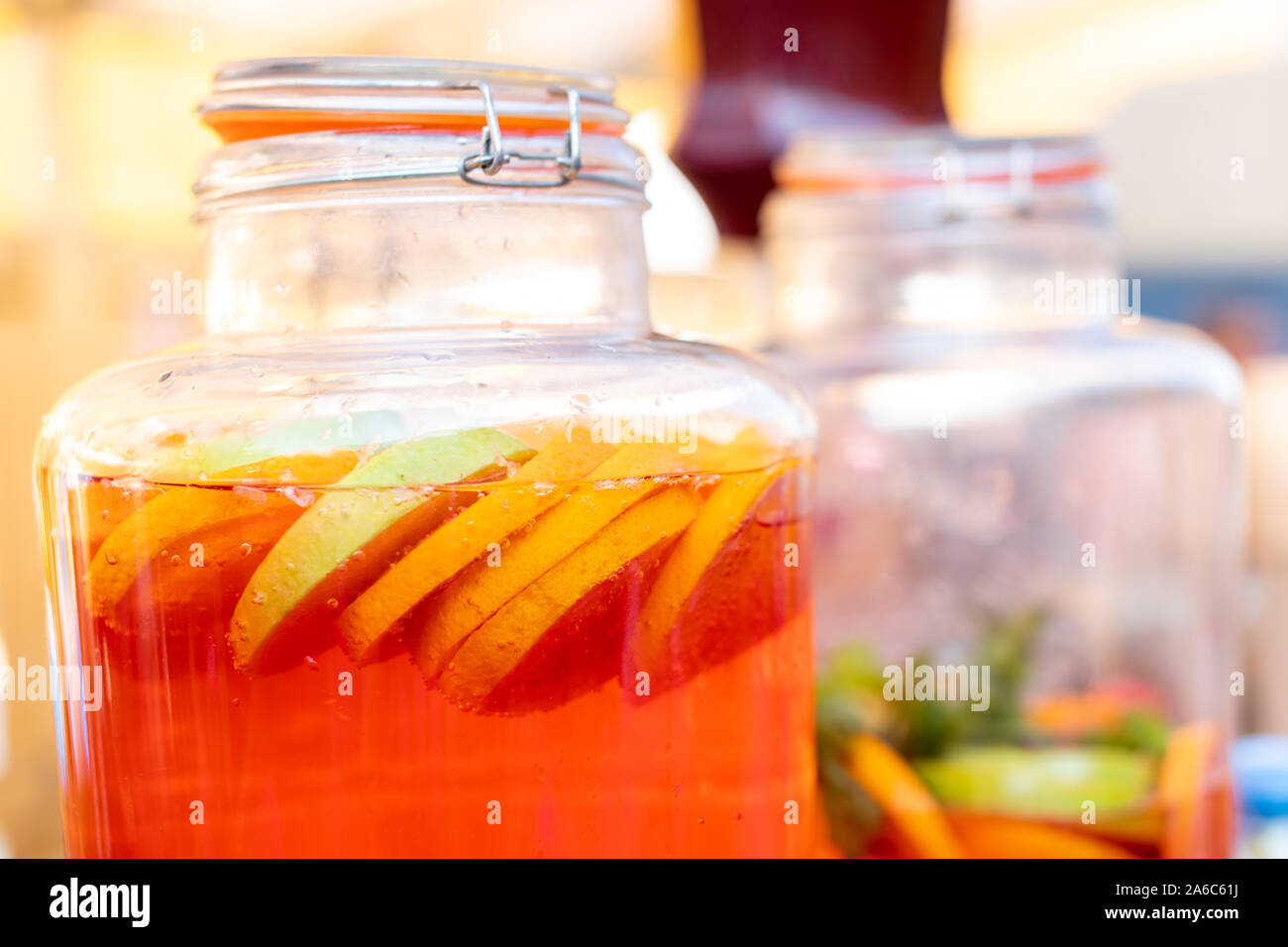 Natural juice made from fresh fruits. Drink at the bar in a glass jar ...