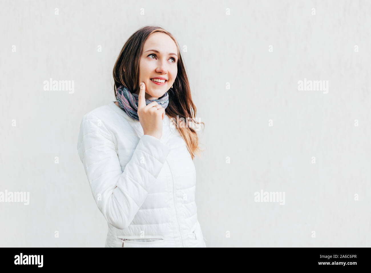 Finger to cheek hi-res stock photography and images - Alamy