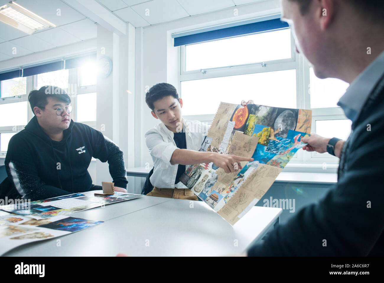 International students in art class study at a table Stock Photo - Alamy