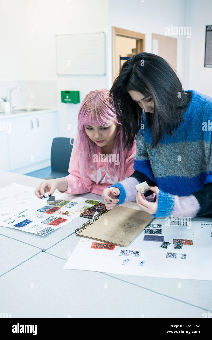 International students in art class study at a table Stock Photo - Alamy