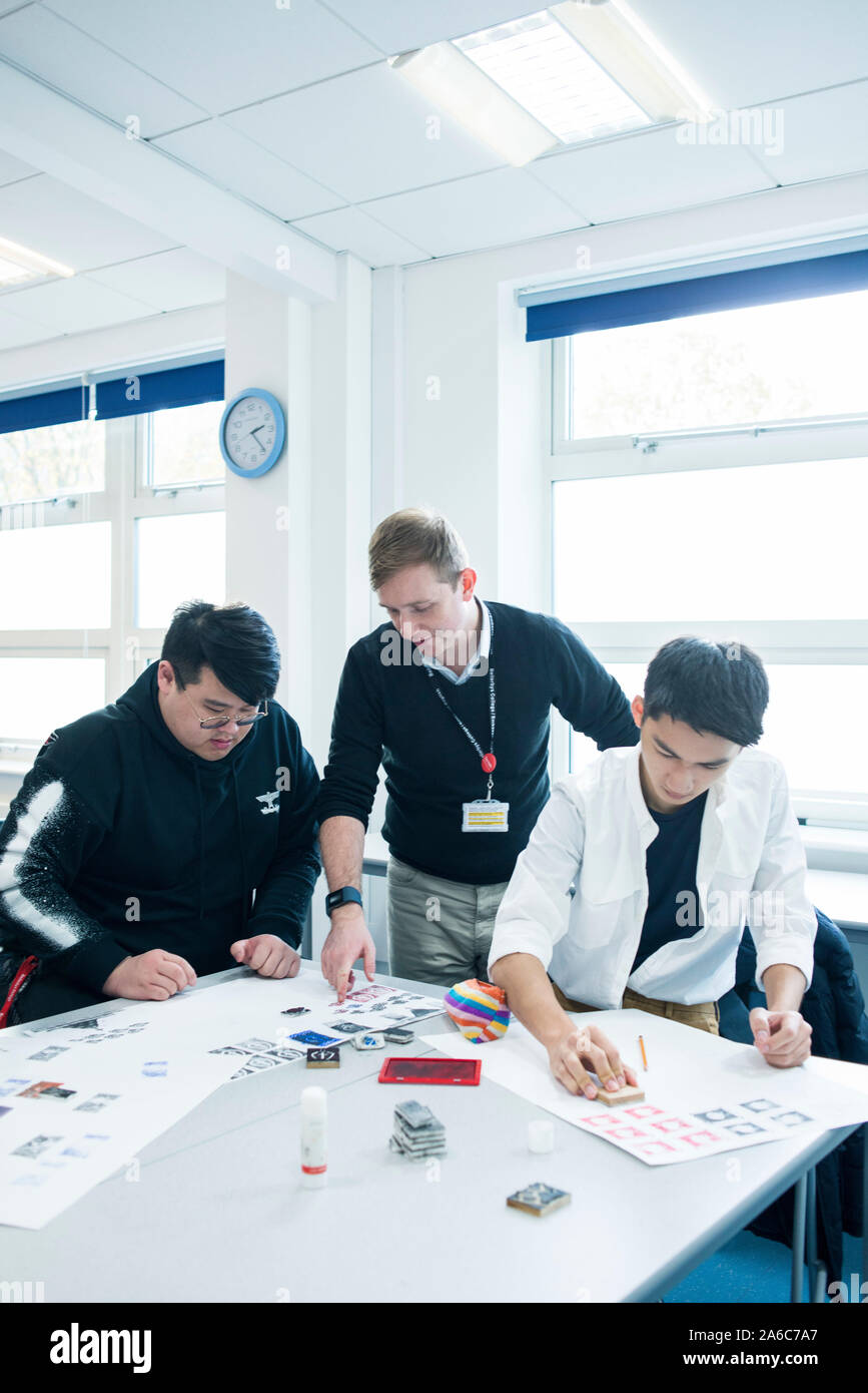 International students in art class study at a table Stock Photo - Alamy