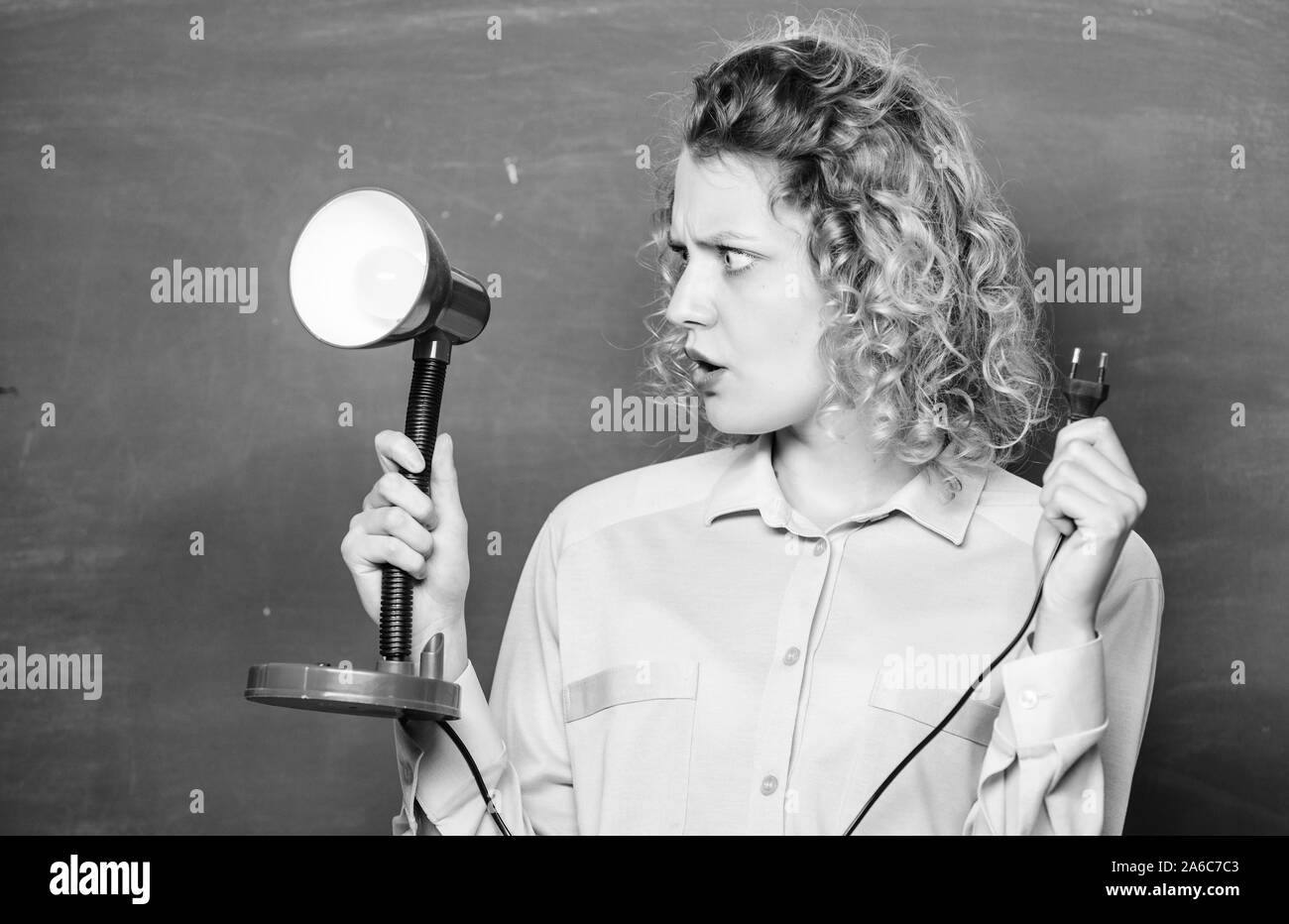 Educational idea. student girl working with electricity. enlightenment ...