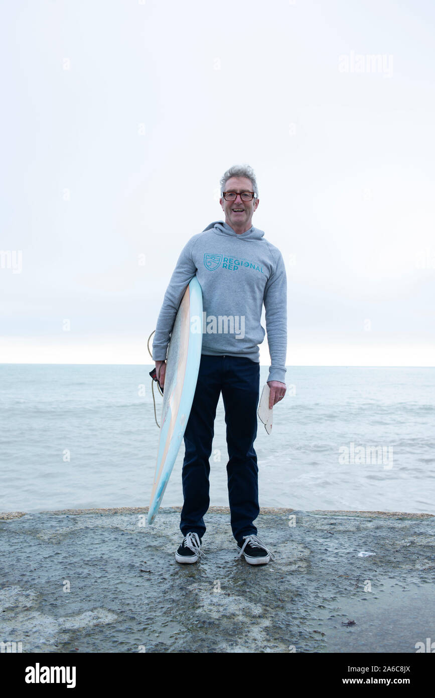 Grey hair surfer hi-res stock photography and images - Alamy