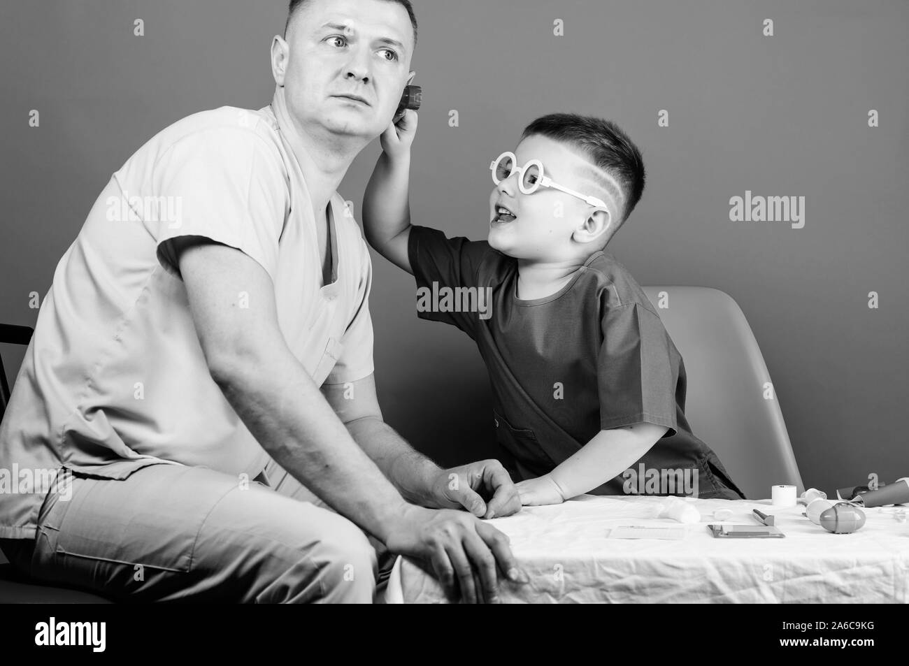 small boy with dad in hospital. happy child with father with ...