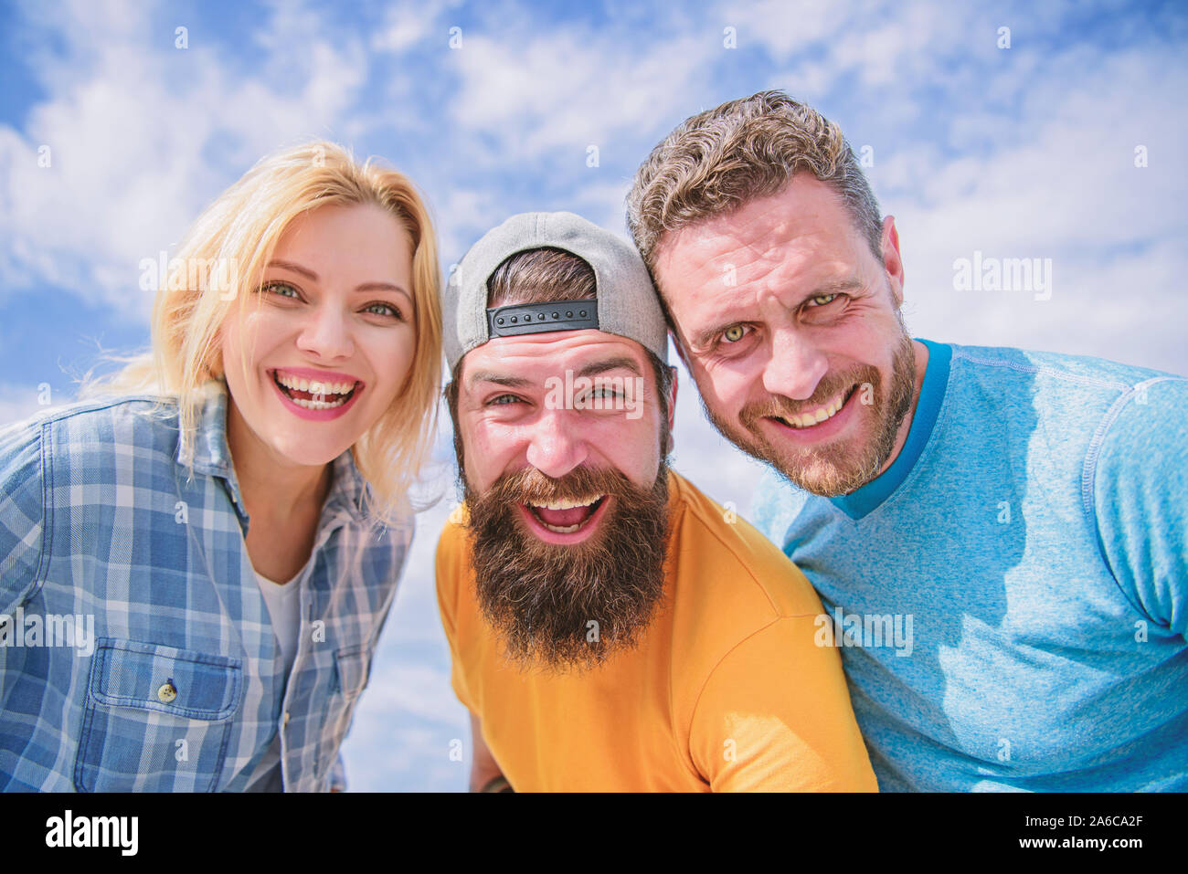 So happy. Enjoying friendship relations. Happy friends smile on cloudy ...