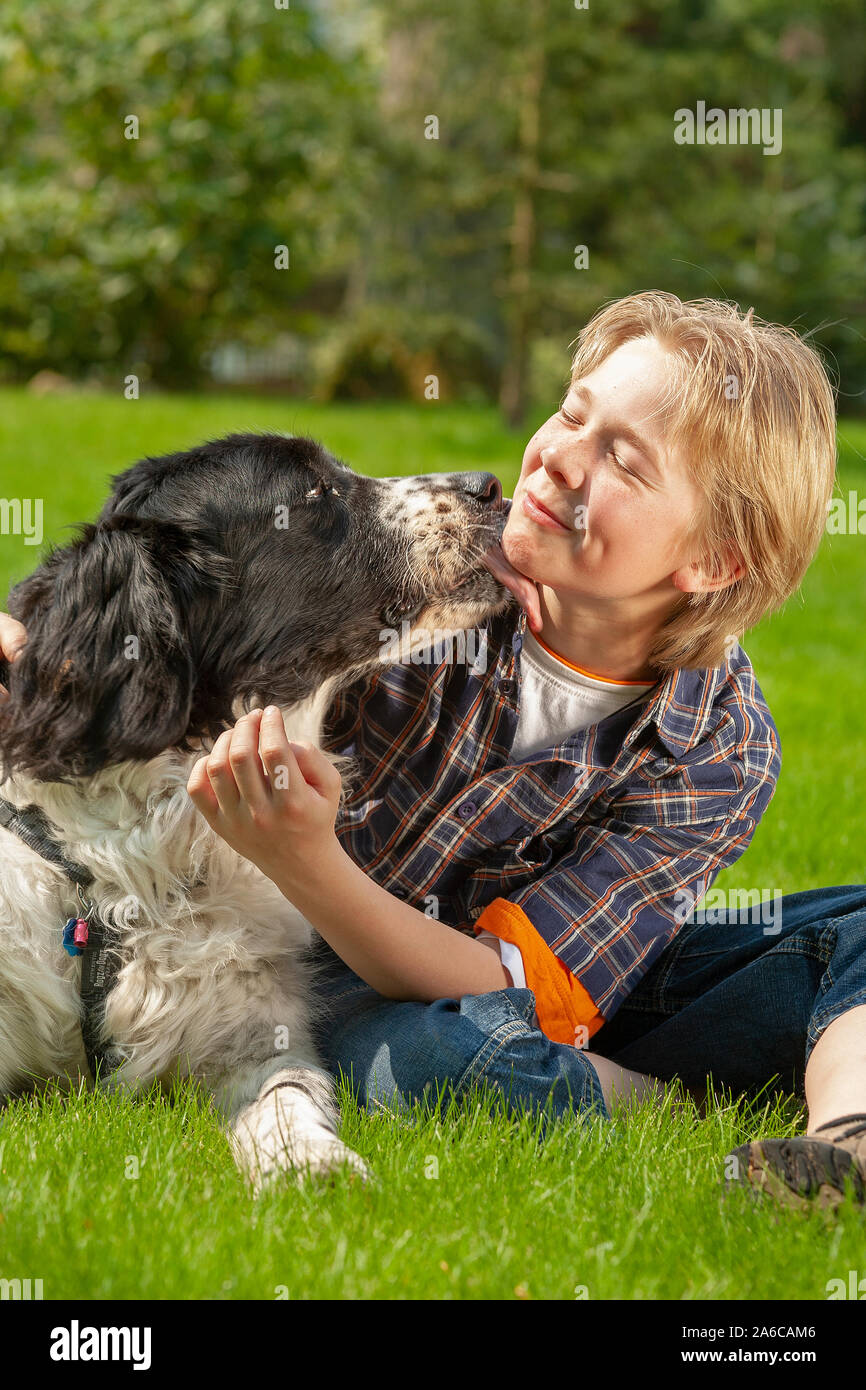 Portrait of a young boy and his dog Stock Photo - Alamy