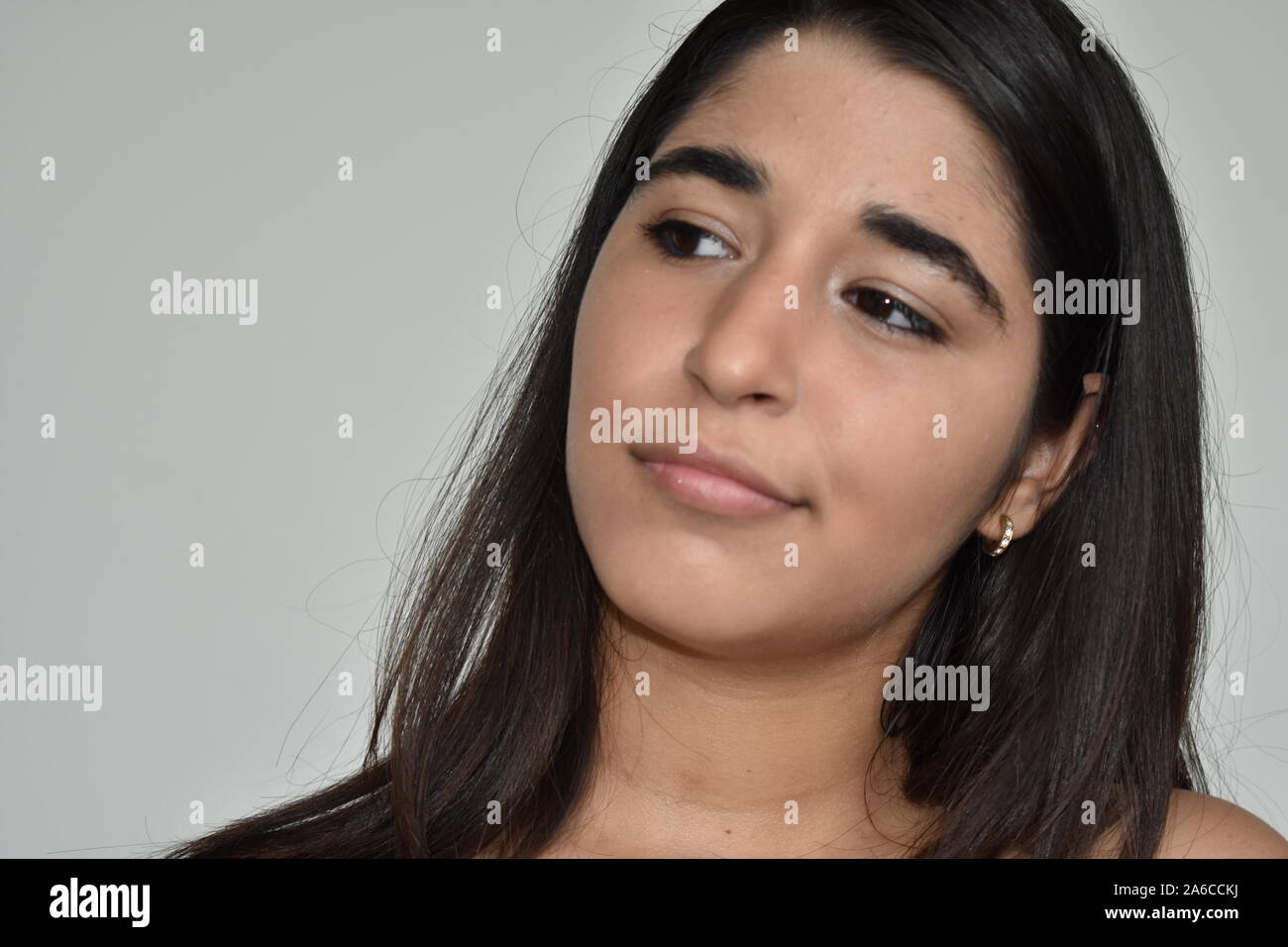 Suspicious Cute Female Stock Photo - Alamy