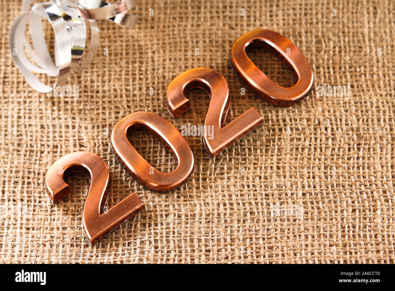 Happy New Year 2020. The number 2020 on brown background Stock Photo ...