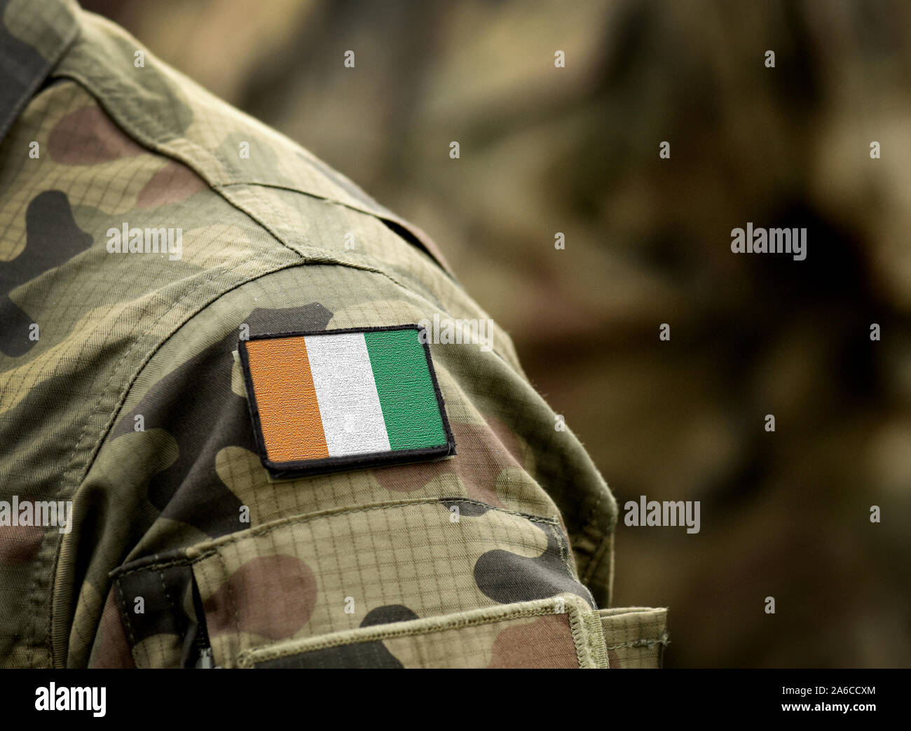 Flag of Ivory Coast or Cote d'Ivoire on military uniform. Army, troops ...