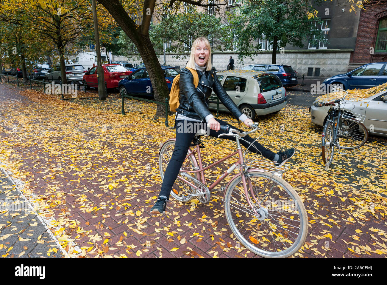 Woman fall cycle hi-res stock photography and images - Alamy