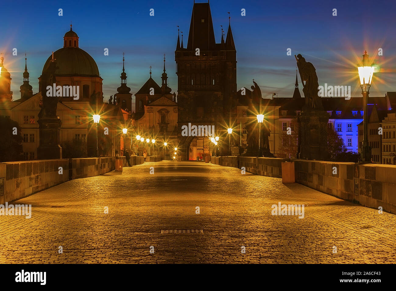 Prague architecture, attractive Charles Bridge with a palace, statues ...