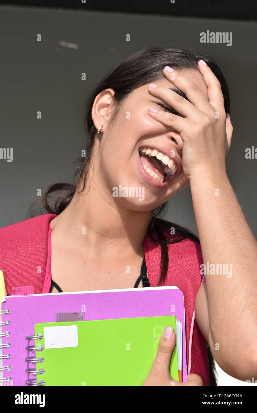 Laughing Female Student Stock Photo - Alamy