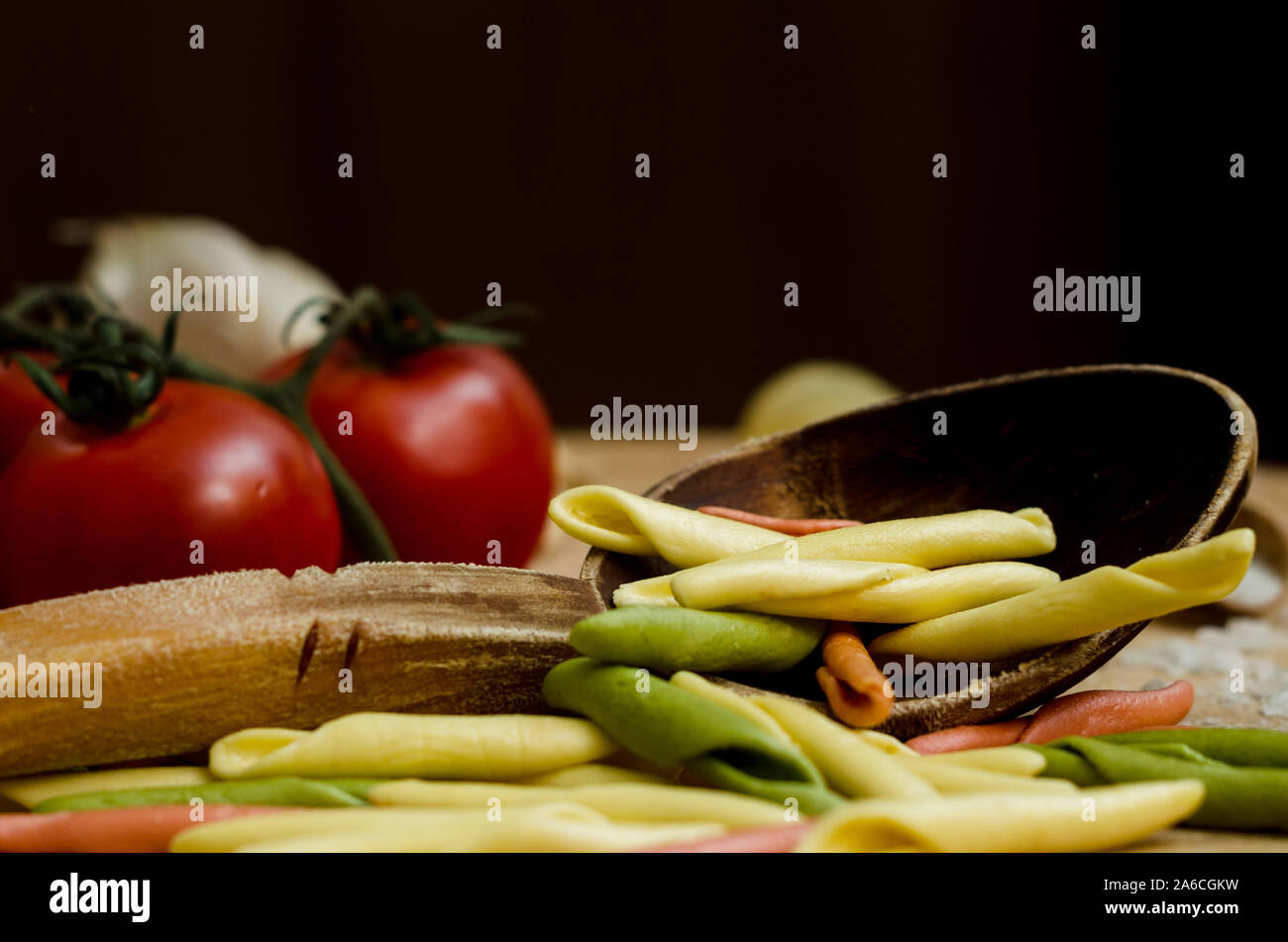 Chef table with ingredients for cooking pasta Stock Photo - Alamy