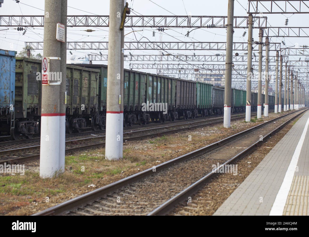 Freight trains are on the tracks at the station Stock Photo - Alamy