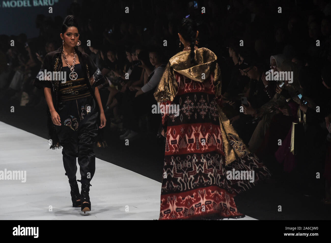 Jakarta, Indonesia. 25th Oct, 2019. Models present creations of Maya ...
