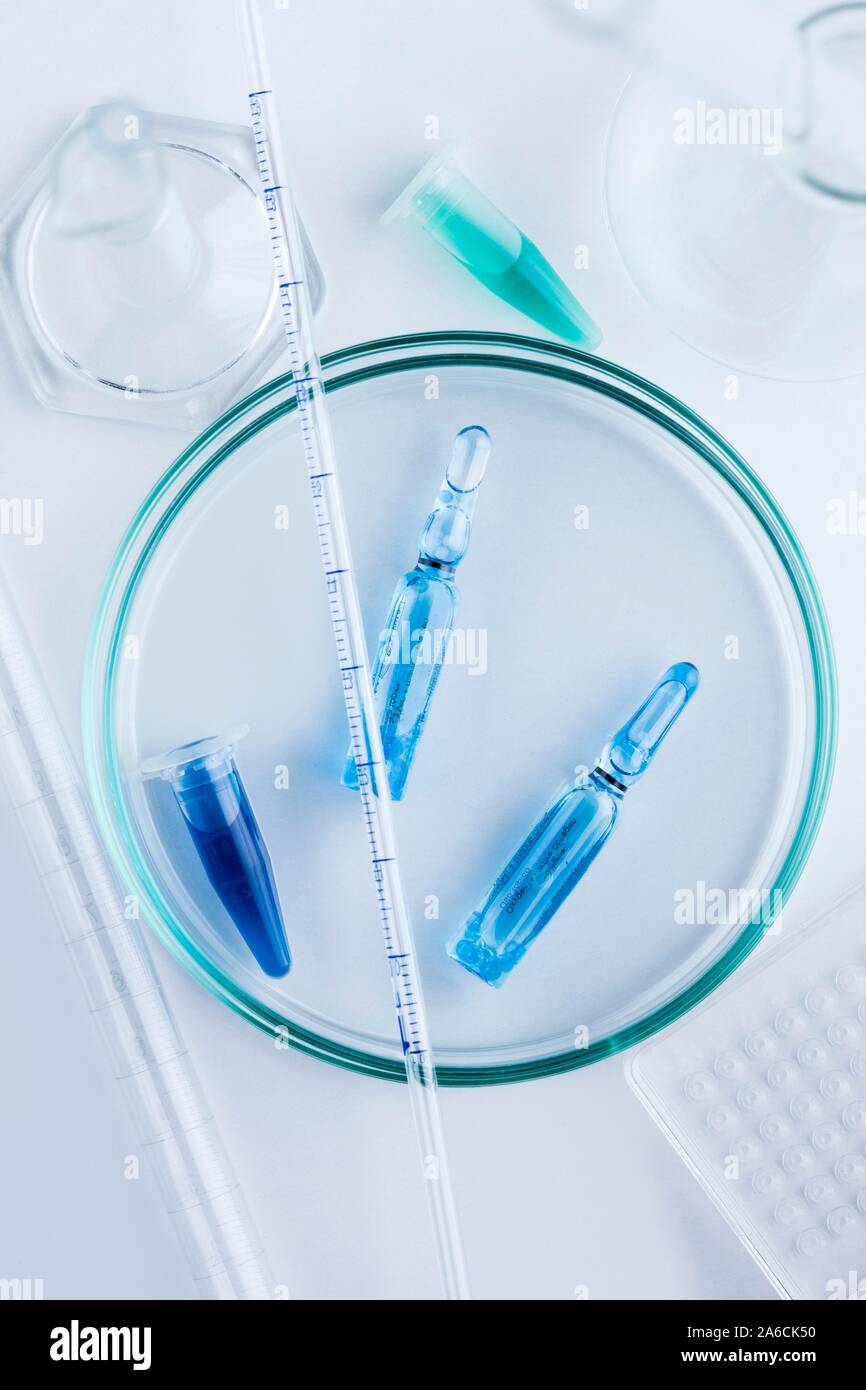 Pharmaceutical research, conceptual image. Vials, centrifuge tubes and ...