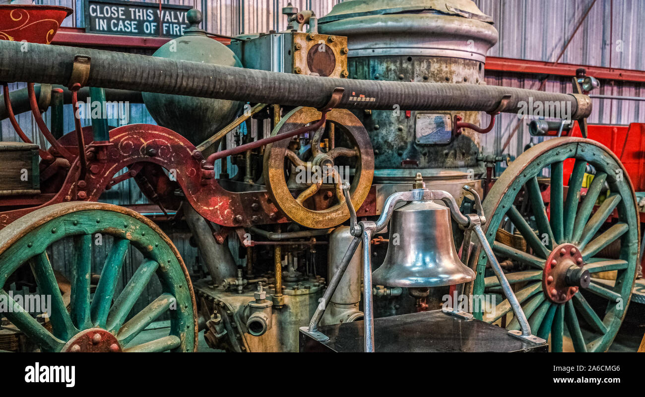 Fire Bell and and Antique Fire Engine Stock Photo - Alamy