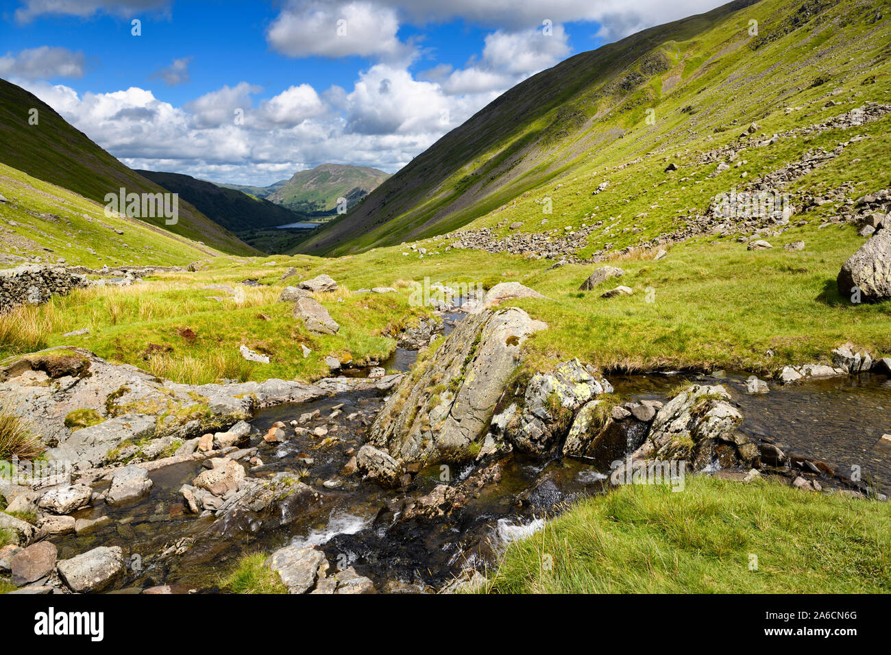 Sun on Kirkstone Beck stream running down Kirkstone Pass to Brother's ...