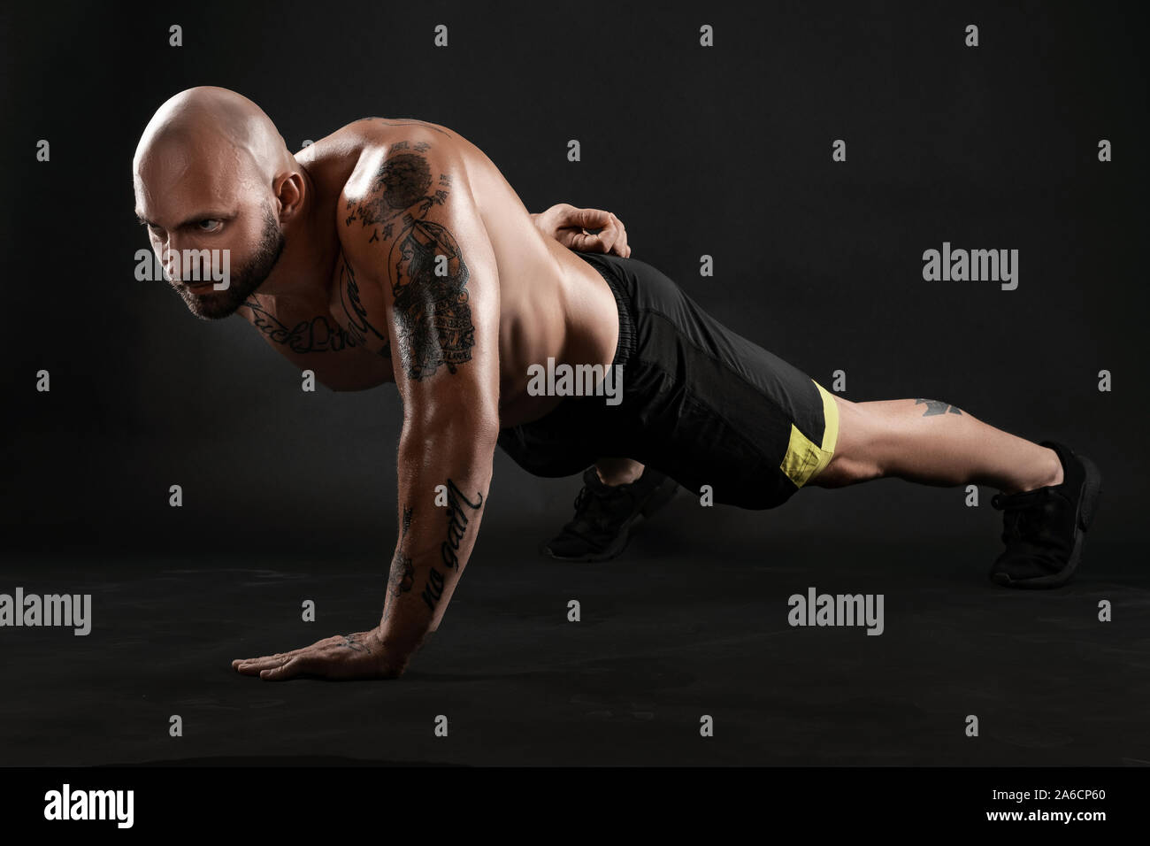 Bearded bald strong man hi-res stock photography and images - Alamy