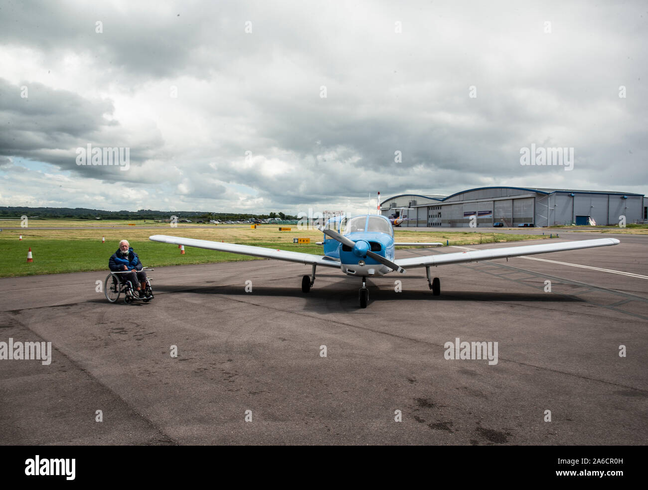 Disabled man has flying lesson Stock Photo - Alamy