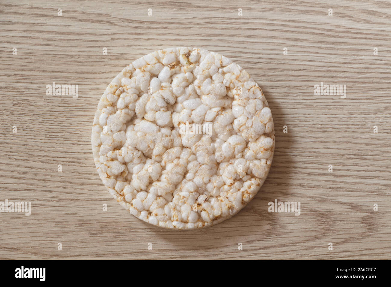 Puffed rice cake for breakfast or snack Stock Photo - Alamy