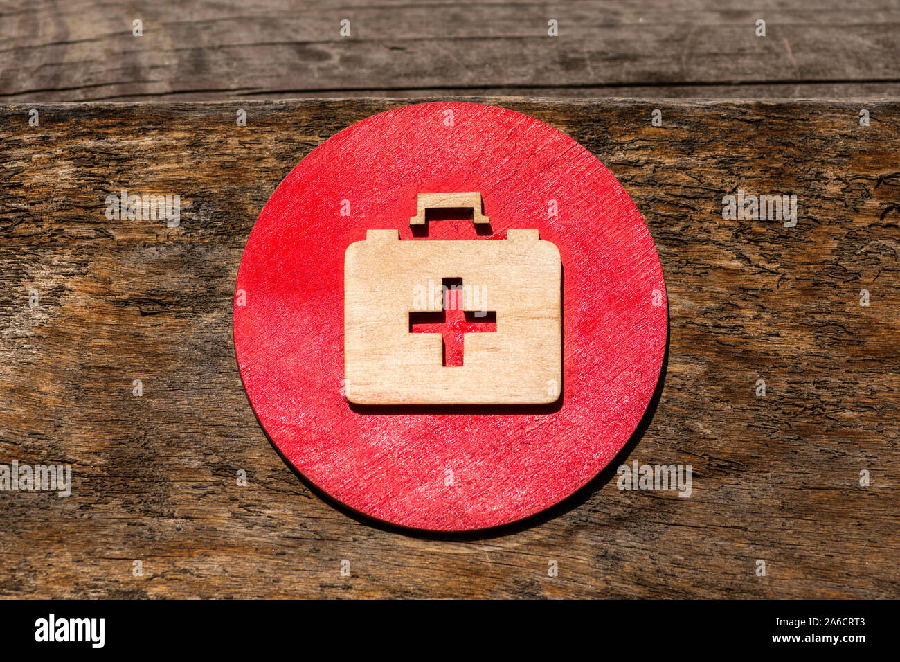 Medical aid symbol on a wooden background. Medical background Stock ...