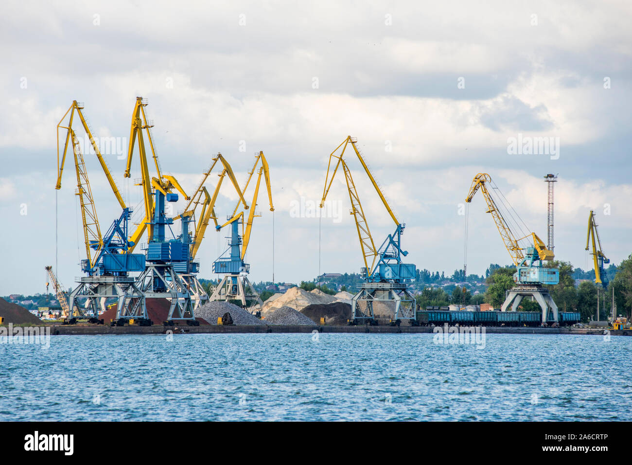 Cargo harbor in city. Loading port. Cargo terminal. Industrial cranes ...