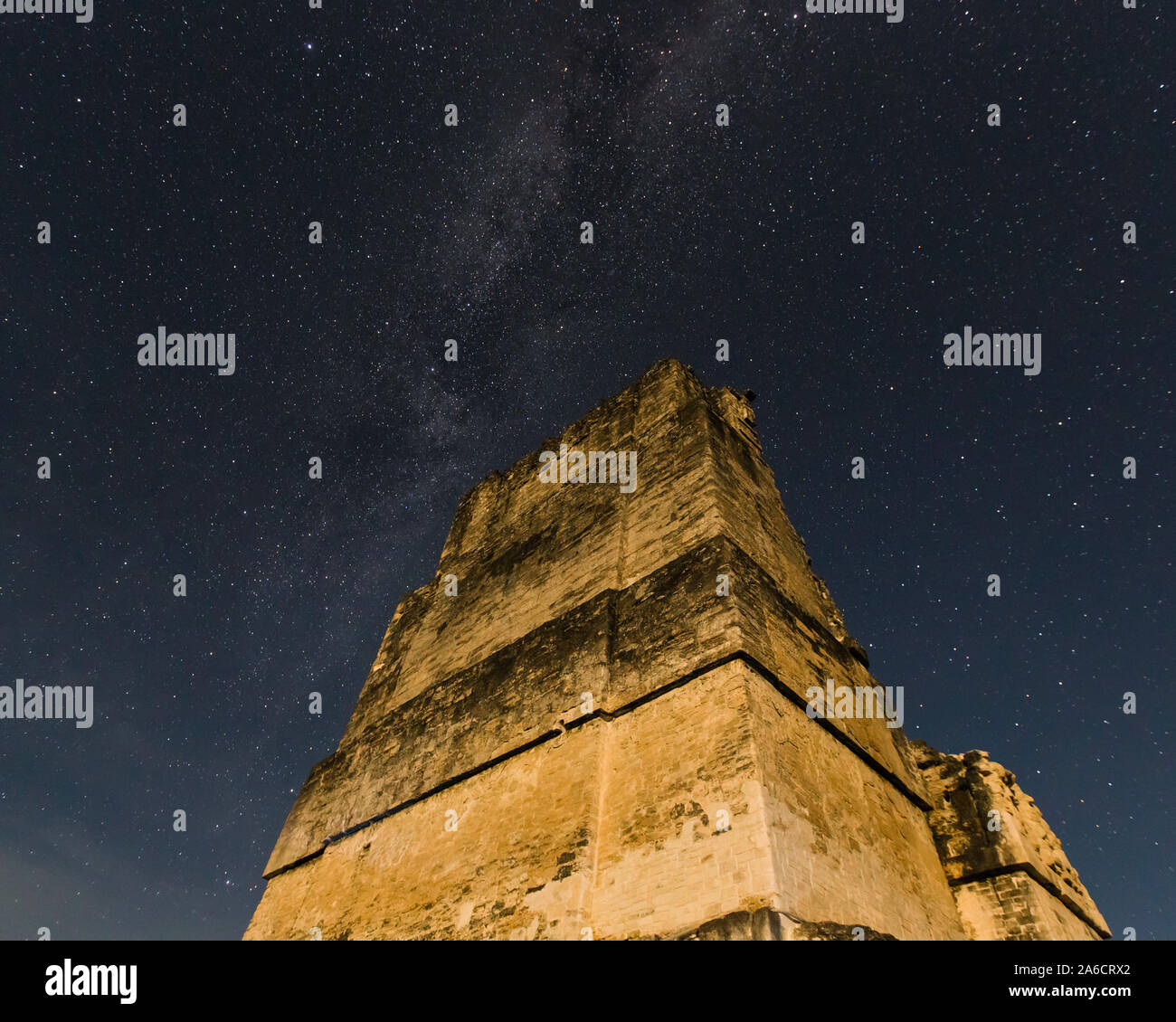 The the stars of the Milky Way over the tall roof comb of Temple II in ...