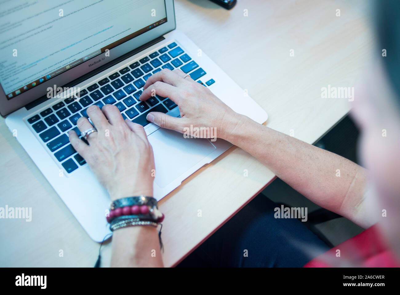 Hands touch typing on laptop hi-res stock photography and images - Alamy