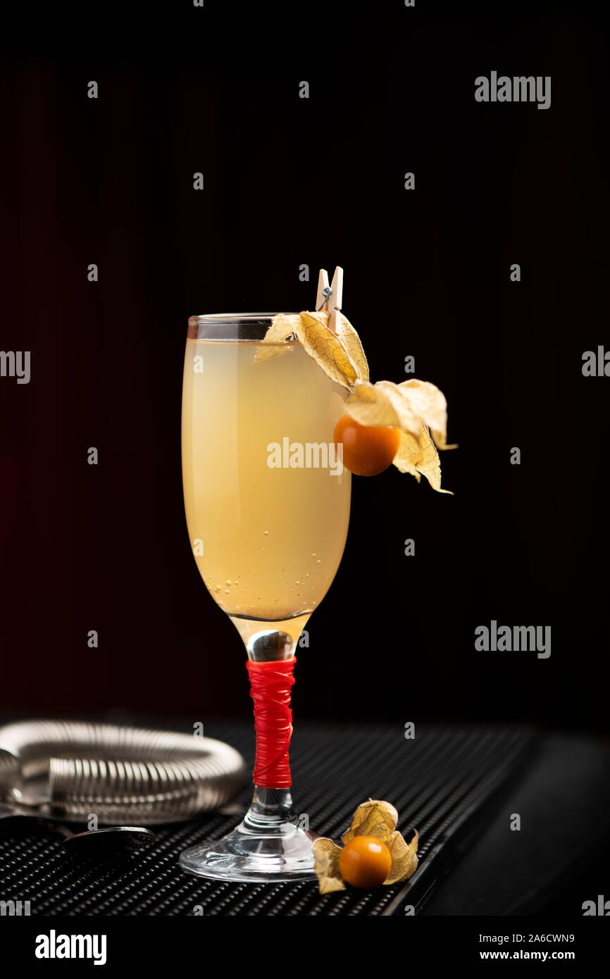 Bellini, alcoholic cocktail with sparkling wine on black Stock Photo ...