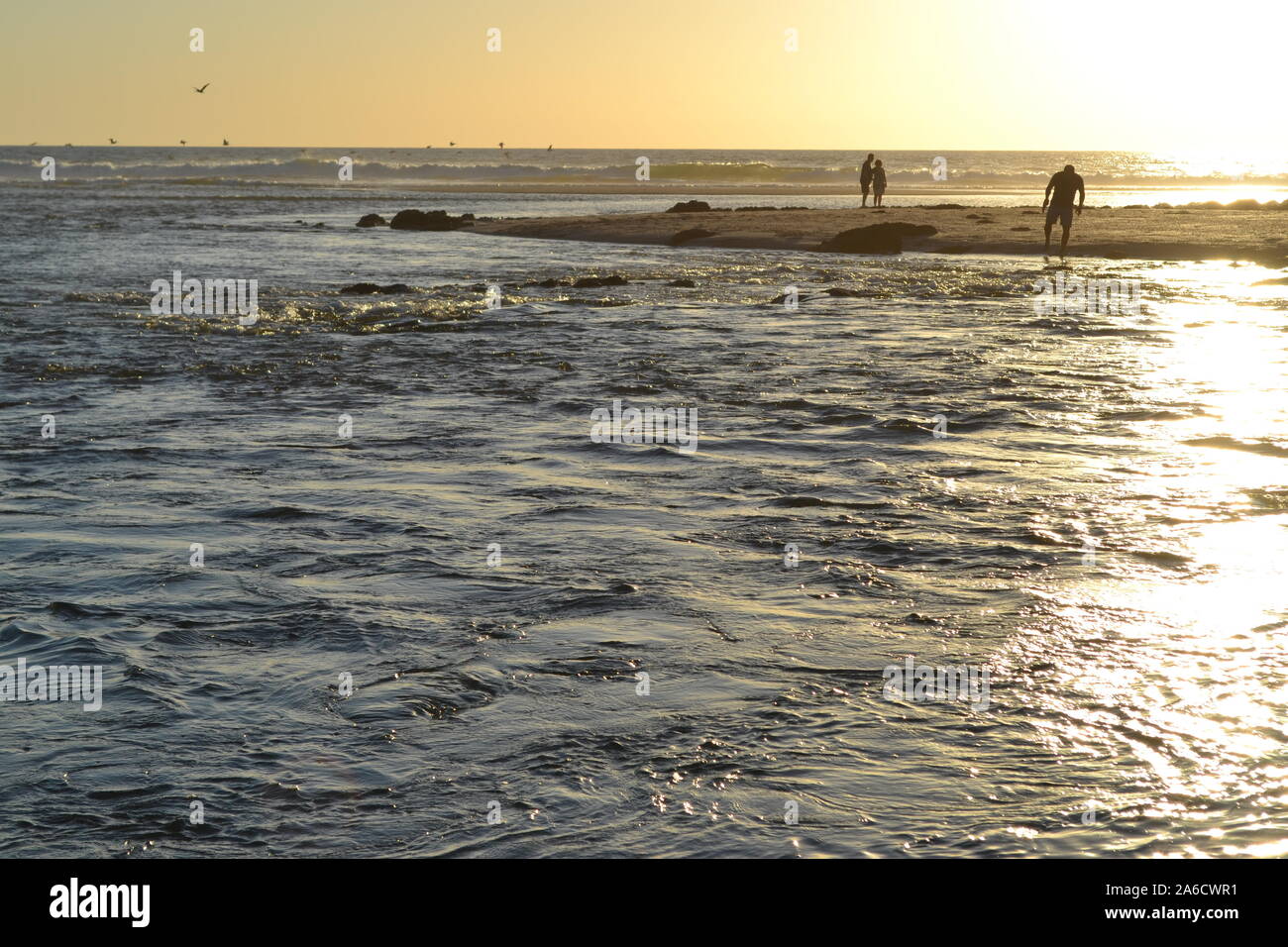 People enjoying Costa Rican beach on Pacific Ocean at sundown Stock ...