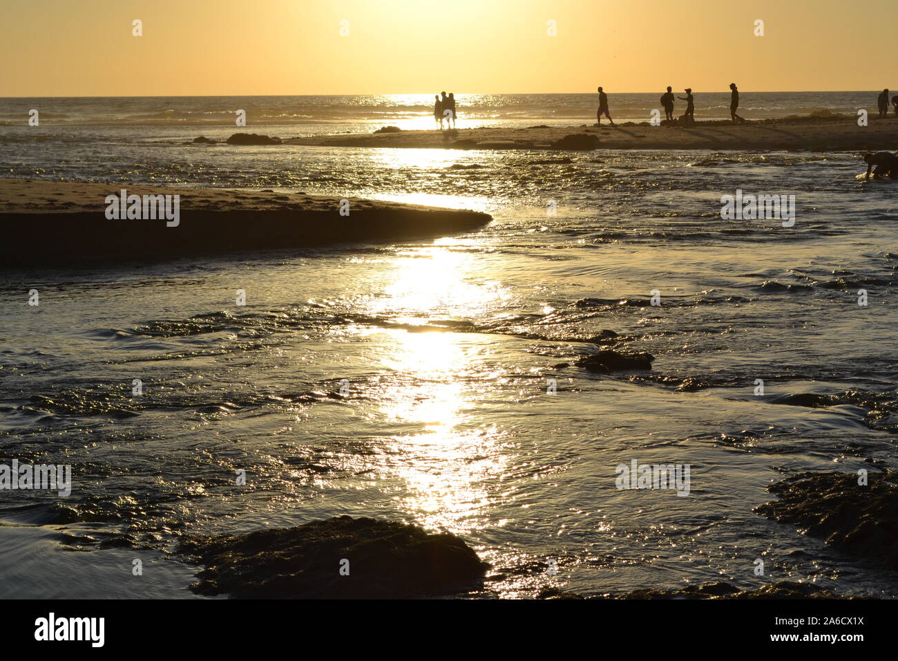 People enjoying Costa Rican beach on Pacific Ocean at sundown Stock ...