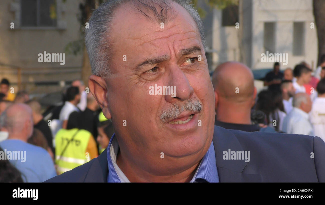 Mohammad Barakeh, an Israeli Arab politician, talking during protest ...