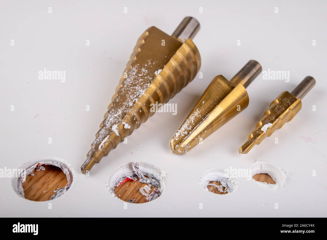 Conical drill used for small housework. Drilling in plastic with tool ...