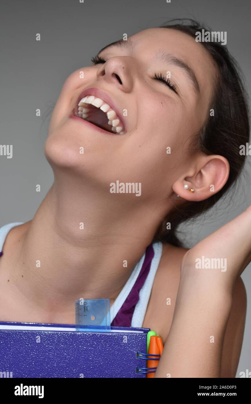 Female Student Laughing Stock Photo - Alamy