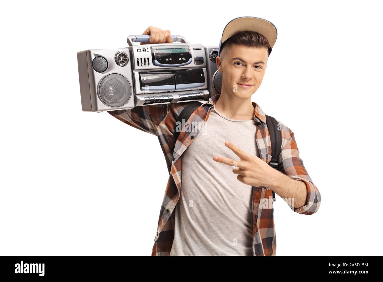 Cool boy making a peace sign and carrying a boombox radio isolated on ...