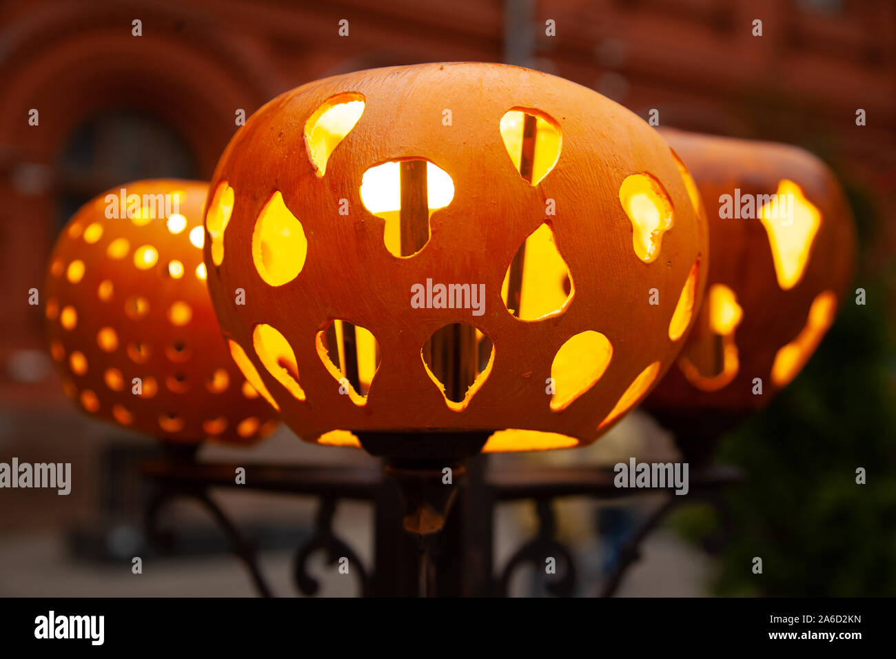 beautiful carved pumpkins put on a light bulb create a Halloween ...
