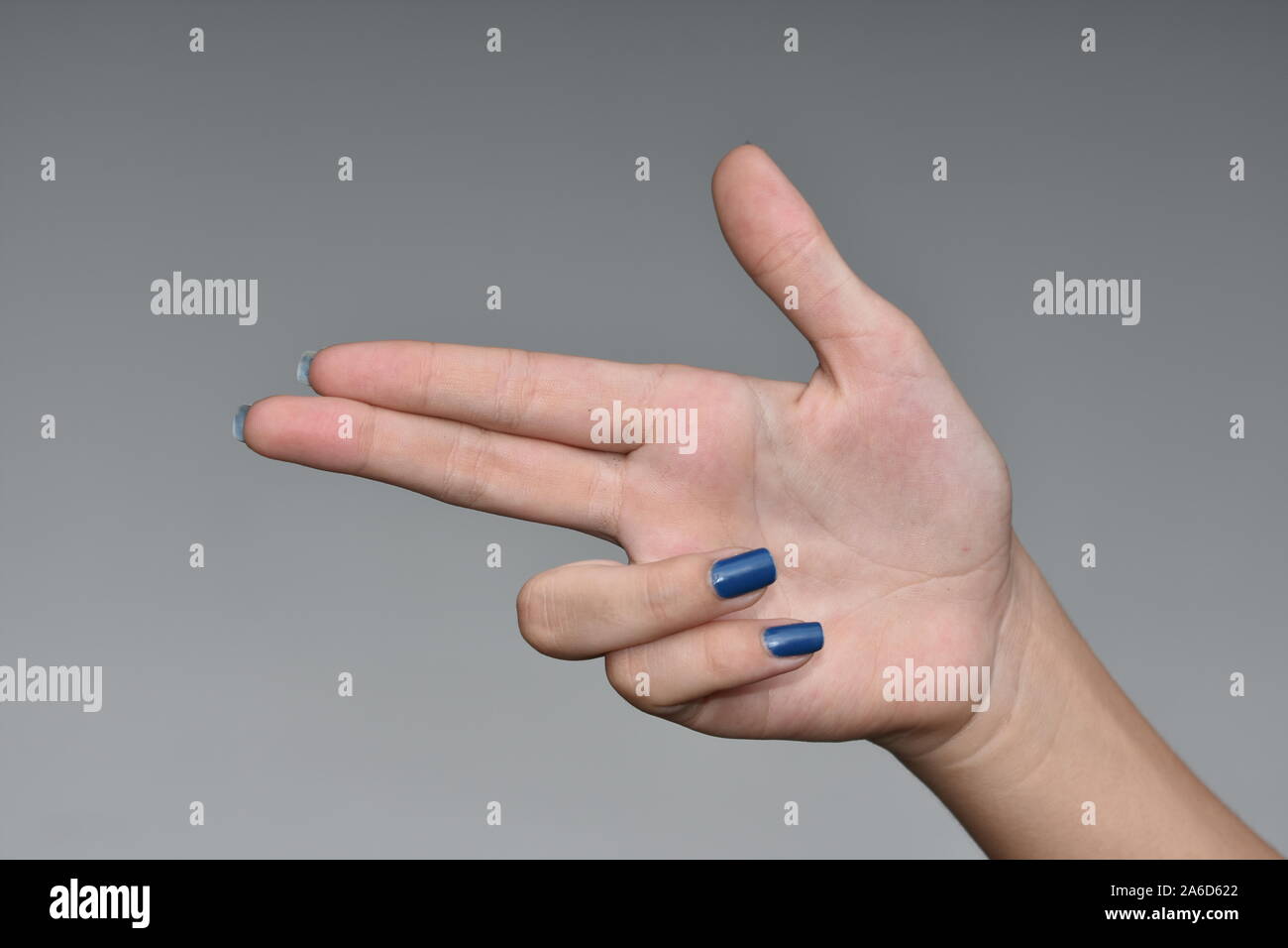 Female Teen Hand Gun Shape Stock Photo - Alamy