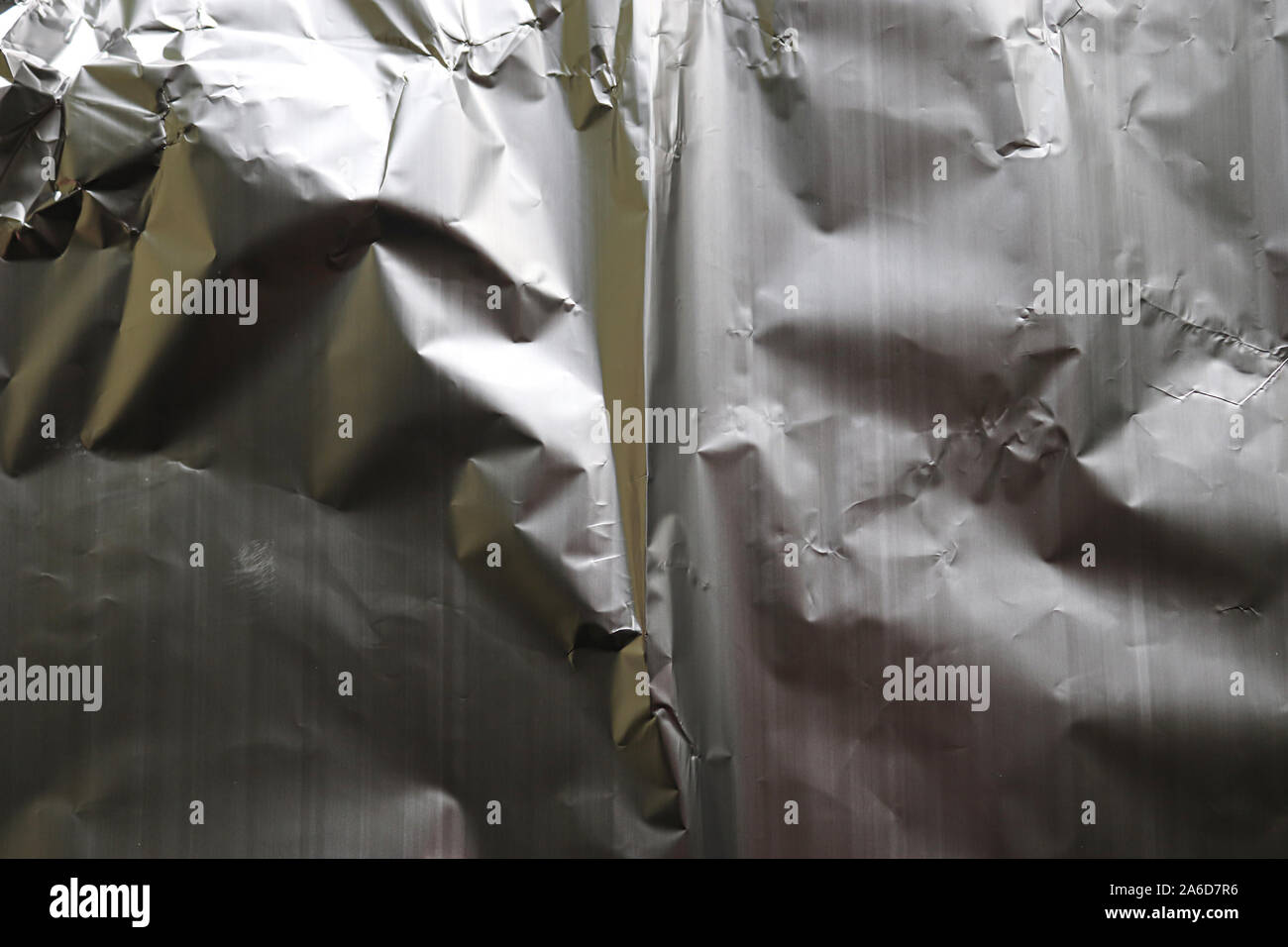 Detailed close up view on a crumpled aluminum foil texture Stock Photo ...