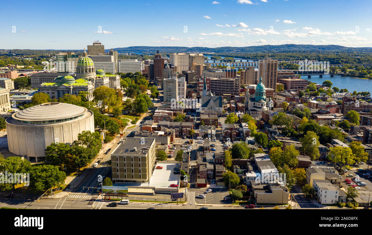 Afternoon light hits the buildings and downtown city center area in ...