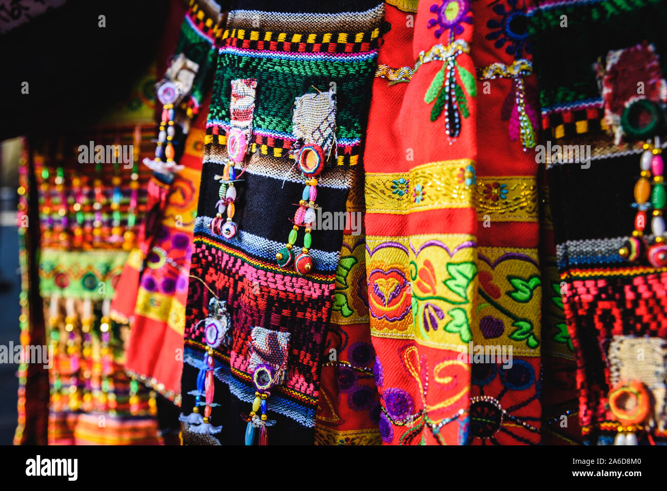 Detail of the colorful embroidery of a typical costume from the Andean ...