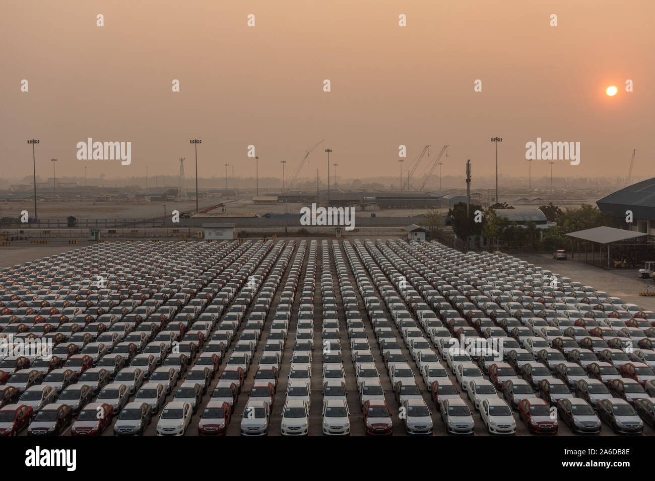 Laem Chabang seaport, Thailand - March 17, 2019: Sunrise through fog ...