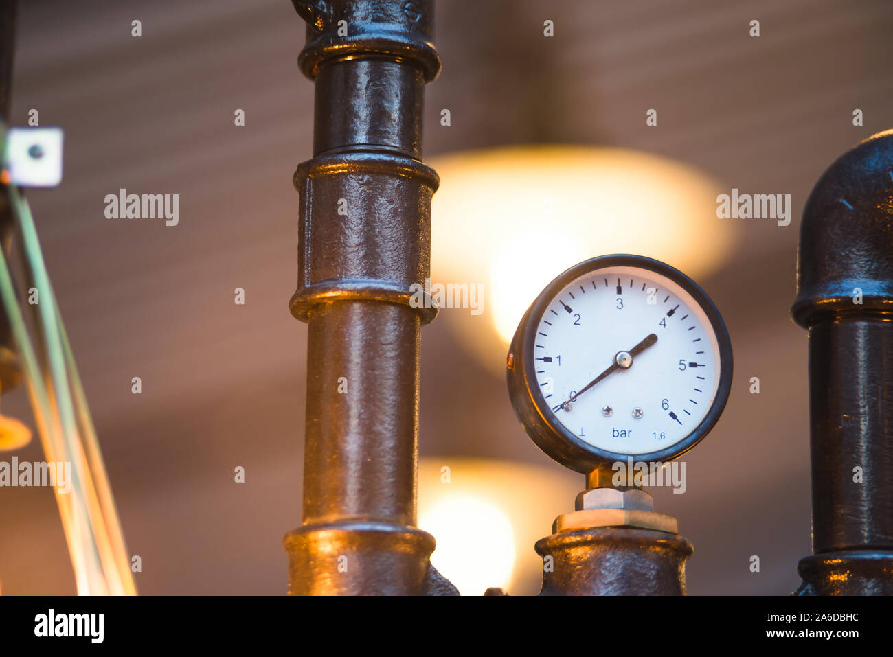 Old vintage pressure gauge with old rusty metal pipes closeup Stock ...