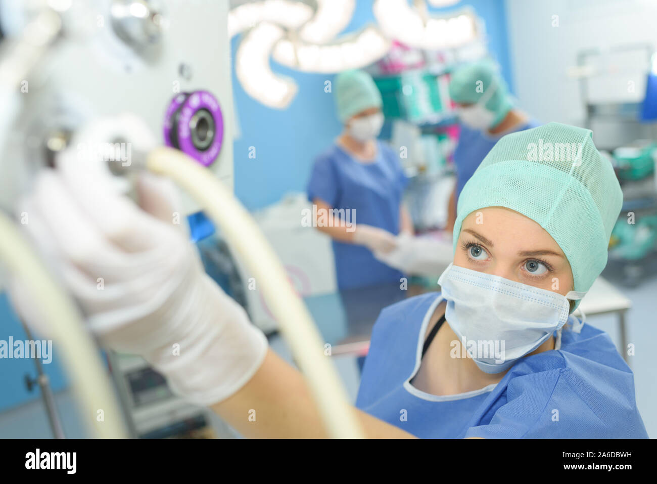 surgeon controlling machine while operation Stock Photo - Alamy